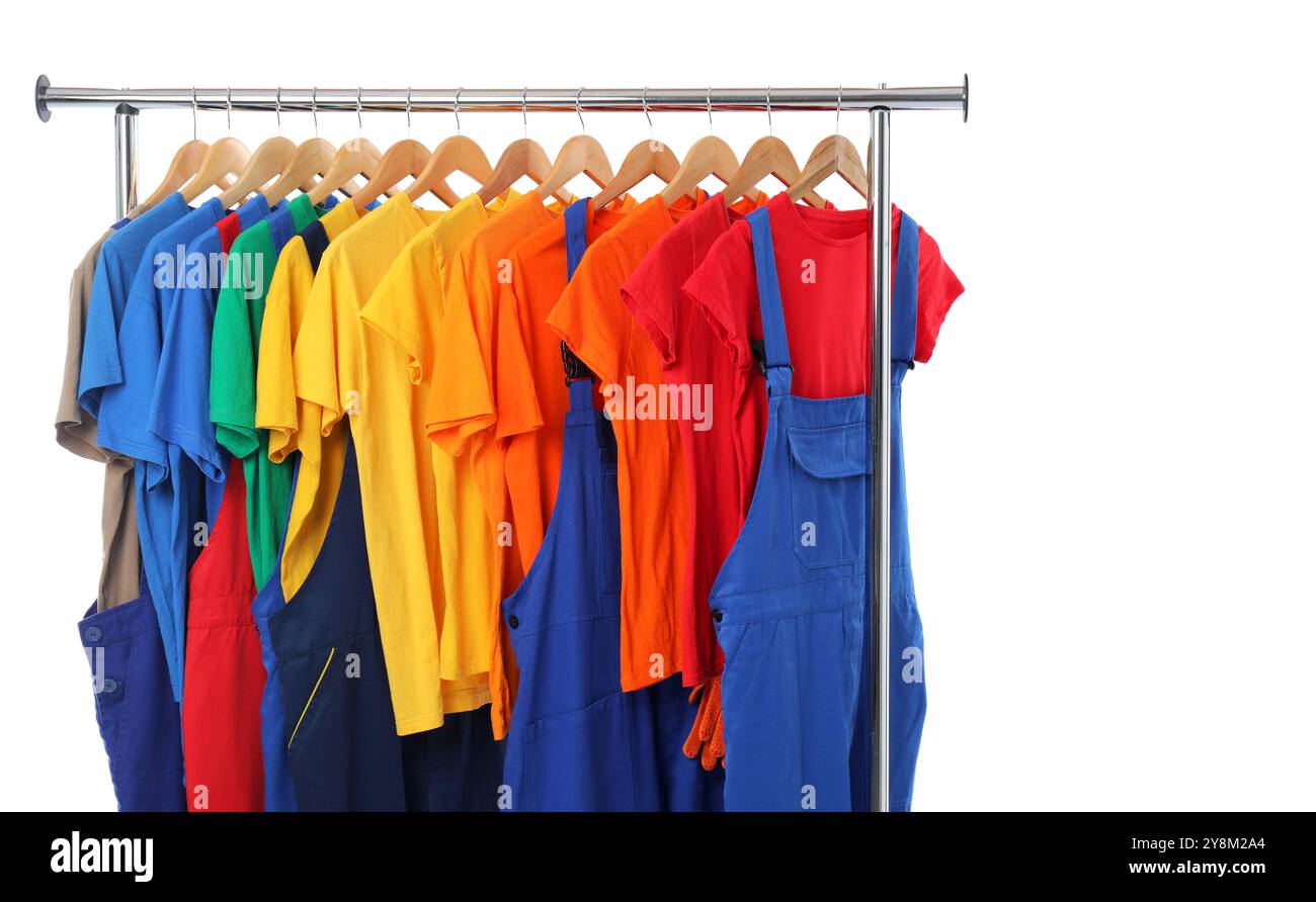 Different workers' uniforms on clothing rack on white background Stock ...