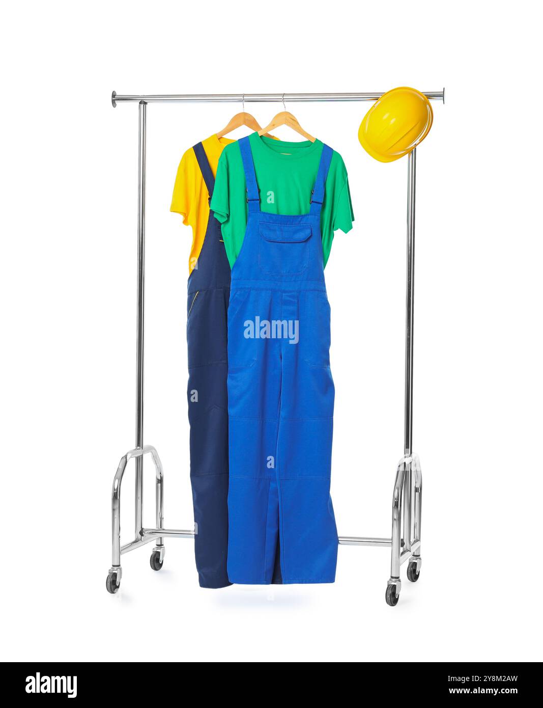 Workers' uniforms on clothing rack isolated on white Stock Photo - Alamy