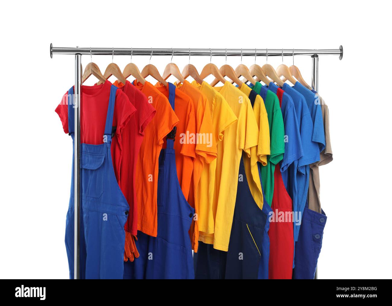 Different workers' uniforms on clothing rack isolated on white Stock ...