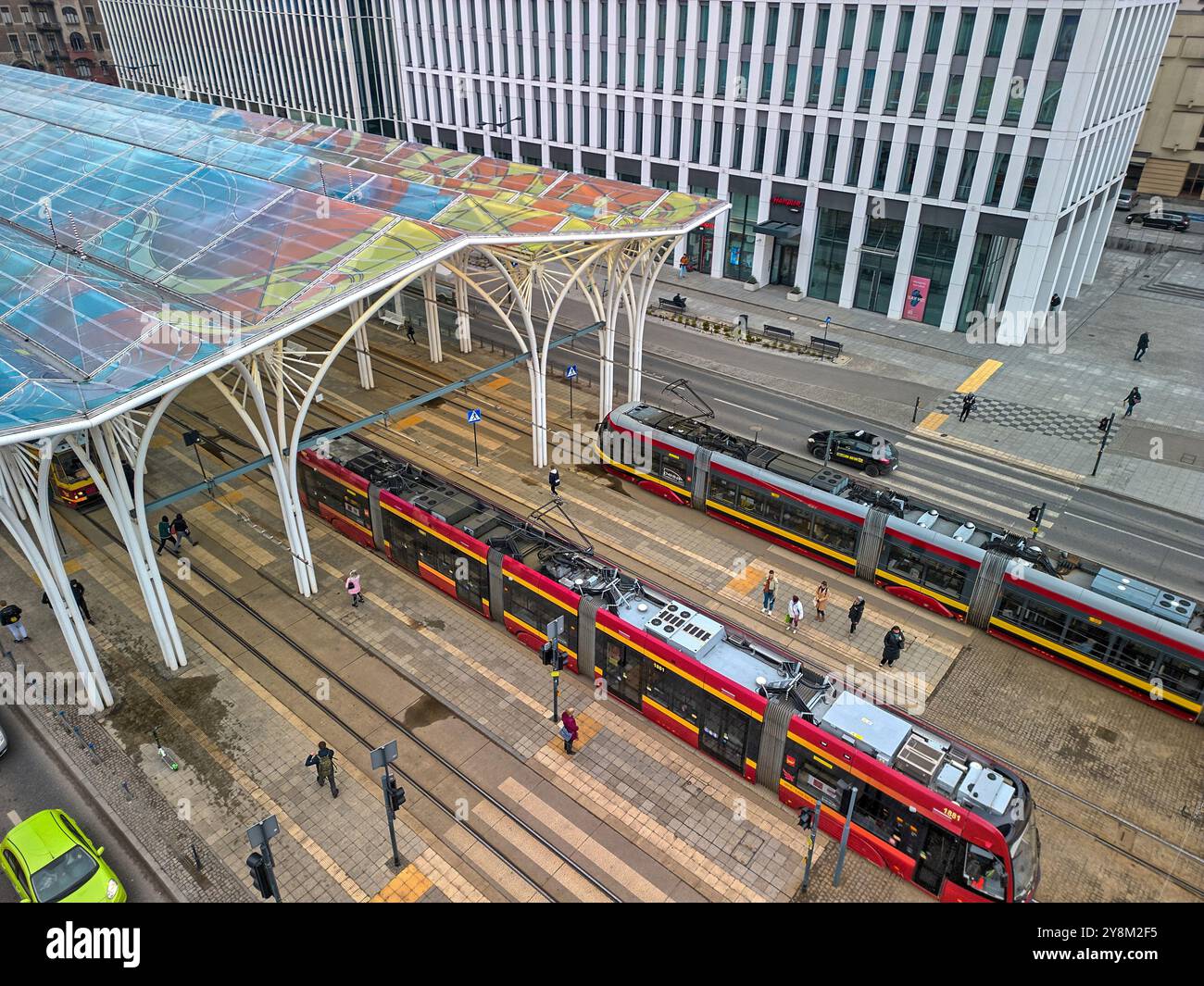 Modern Tram Station in Łódź, Poland, with Vibrant Trams and Colorful ...