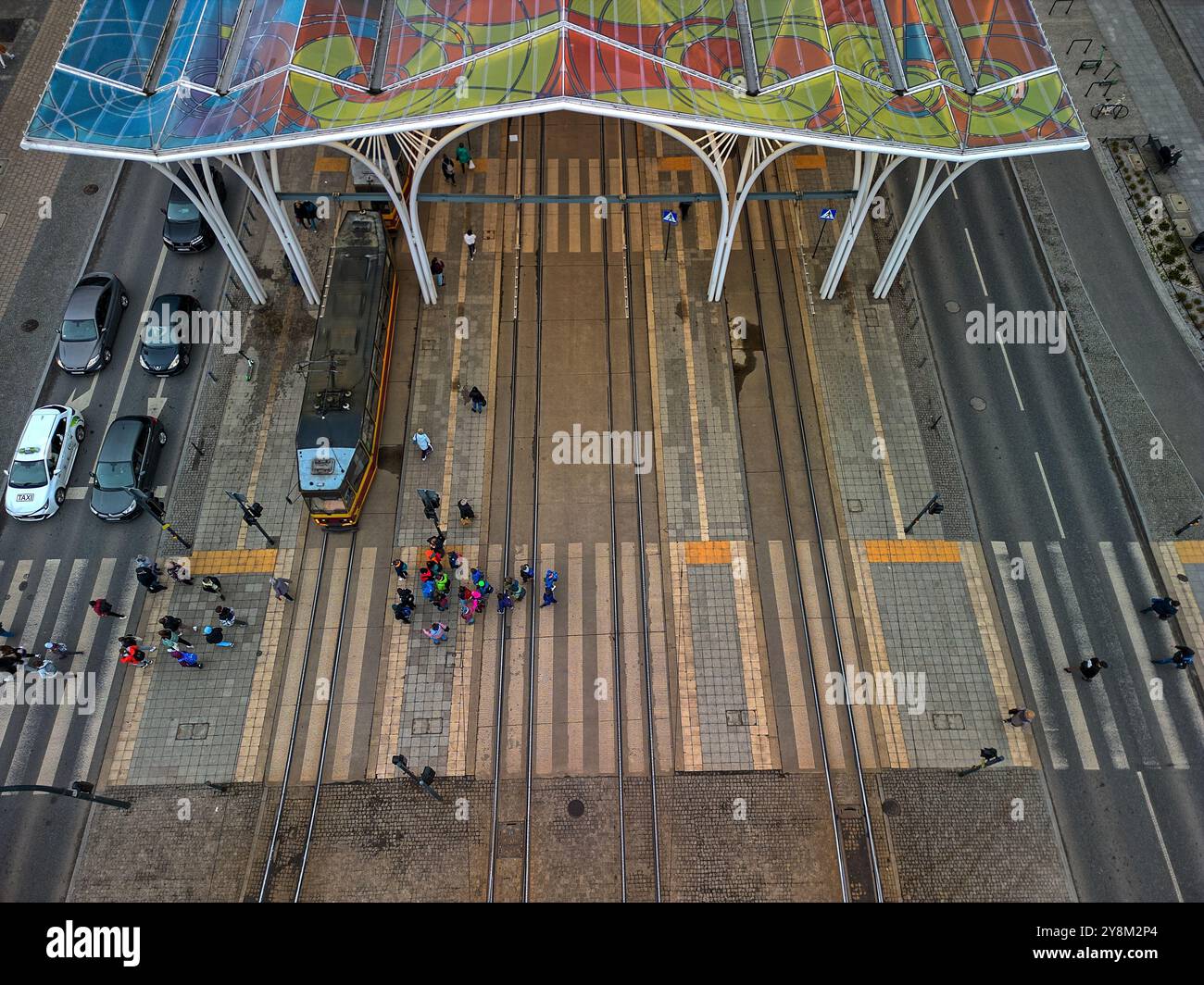 Modern Tram Station in Łódź, Poland, with Vibrant Trams and Colorful ...