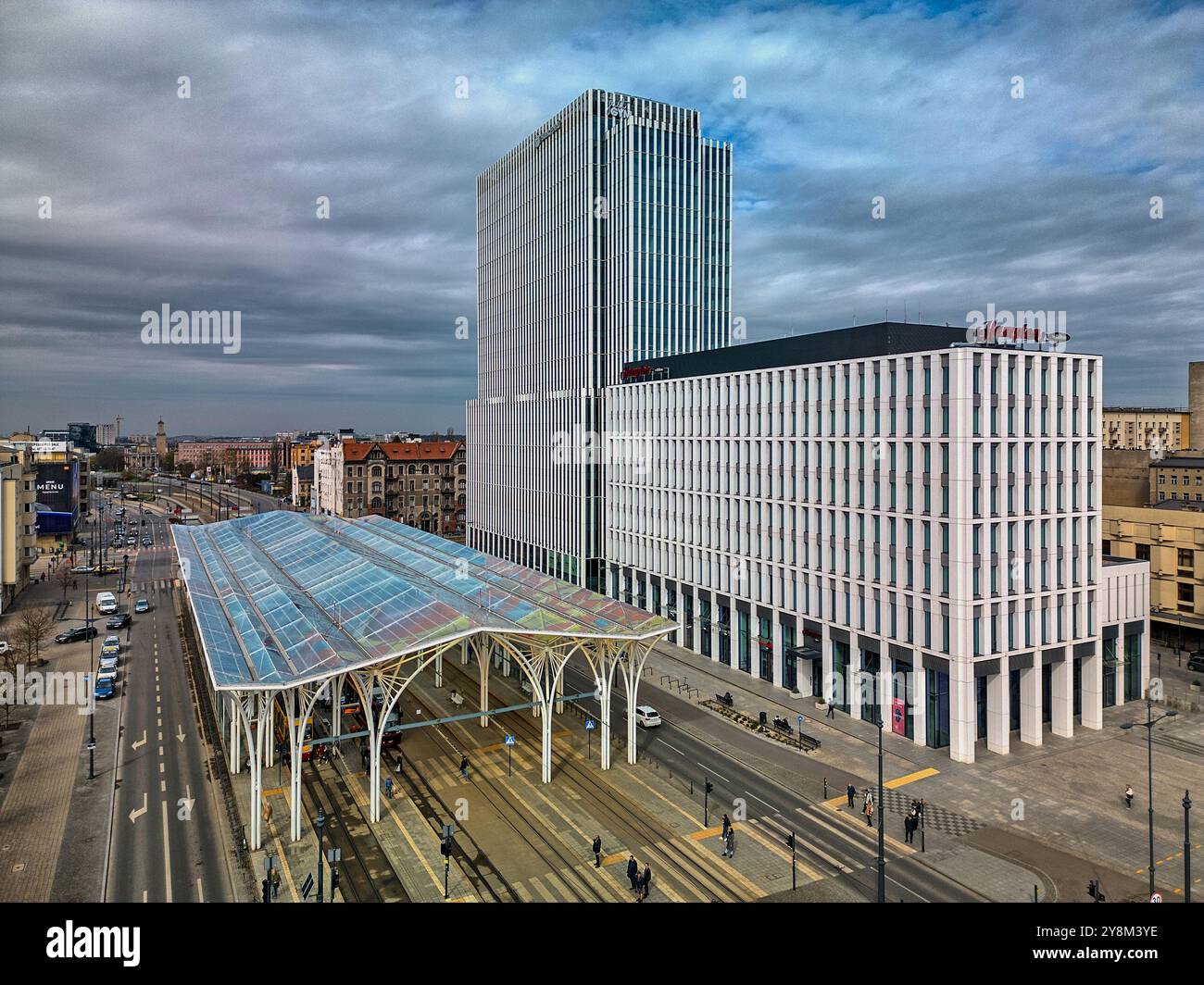 Modern Cityscape in Łódź, Poland, Featuring a Glass-Covered Tram ...