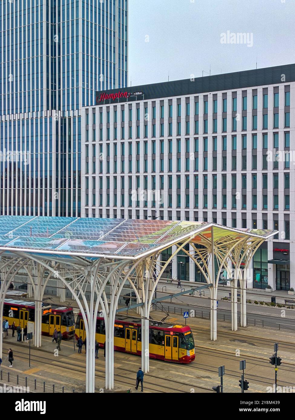 Modern Tram Station in Łódź, Poland, with Vibrant Trams and Colorful ...