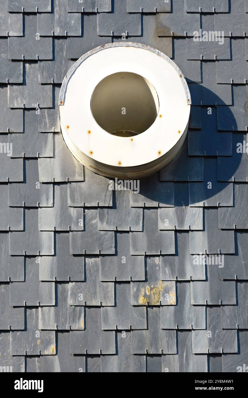 Round ventilation windows on wall covered with slates - La Trimouille ...