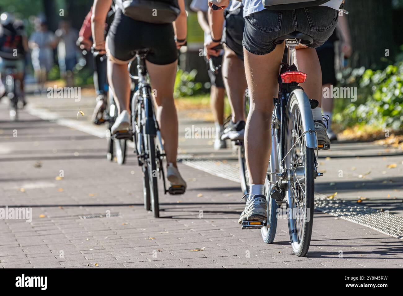 A group of cyclists in shorts Stock Photo - Alamy
