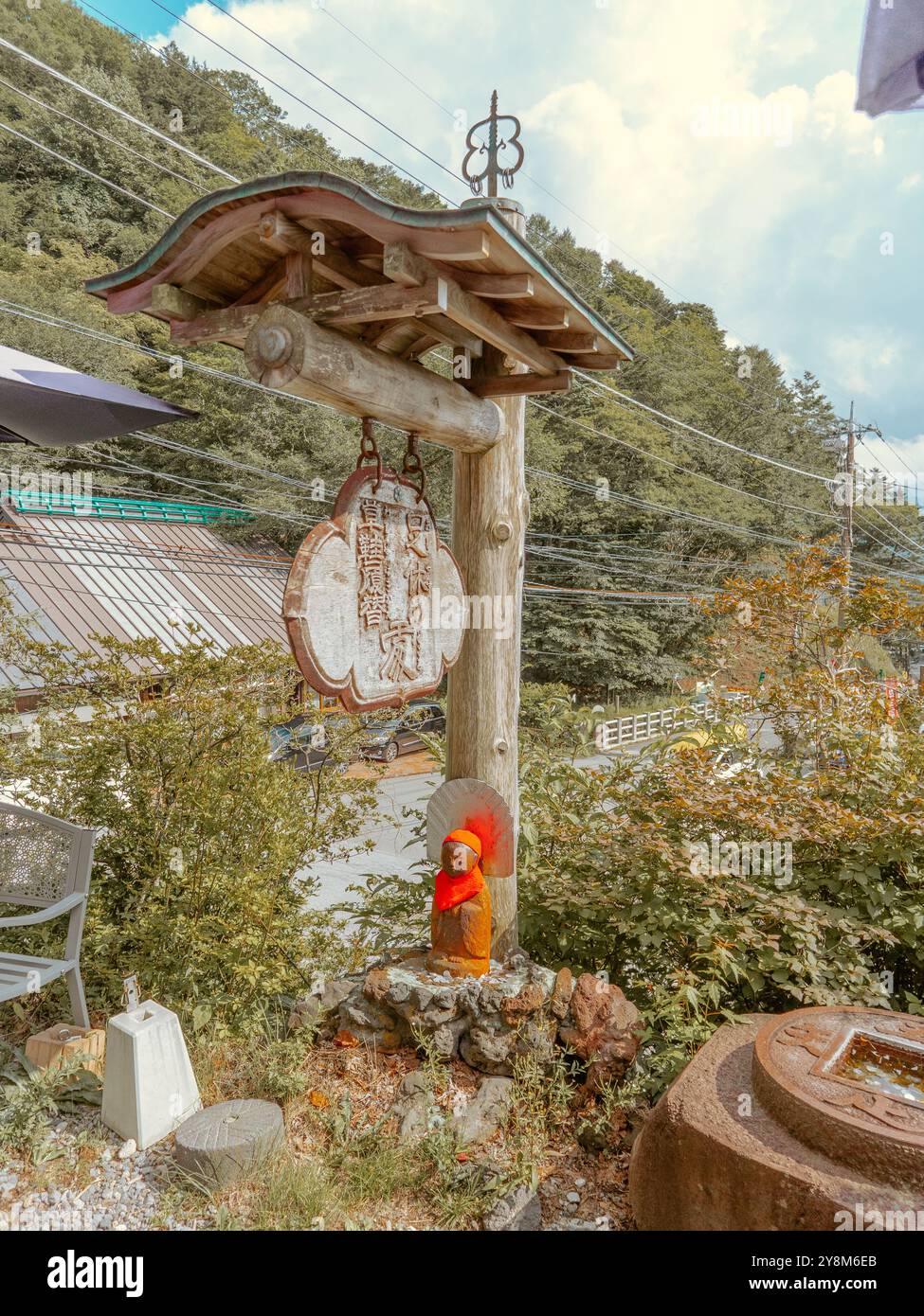 Sign and small statue at rural shrine, Nikko Stock Photo - Alamy