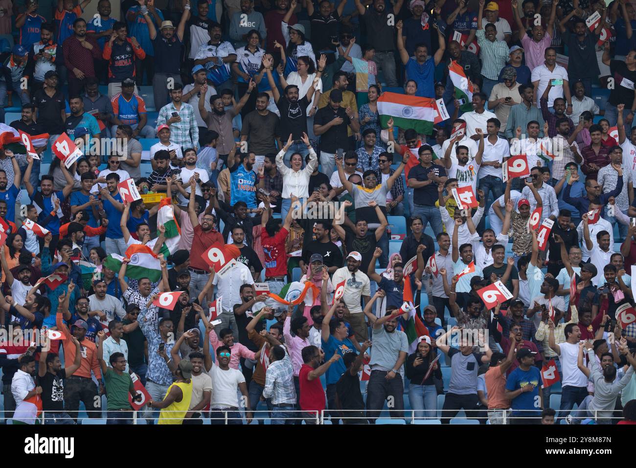 Indian fans cheer as Pakistan lost its first wicket during the ICC Women's T20 World Cup 2024 ...