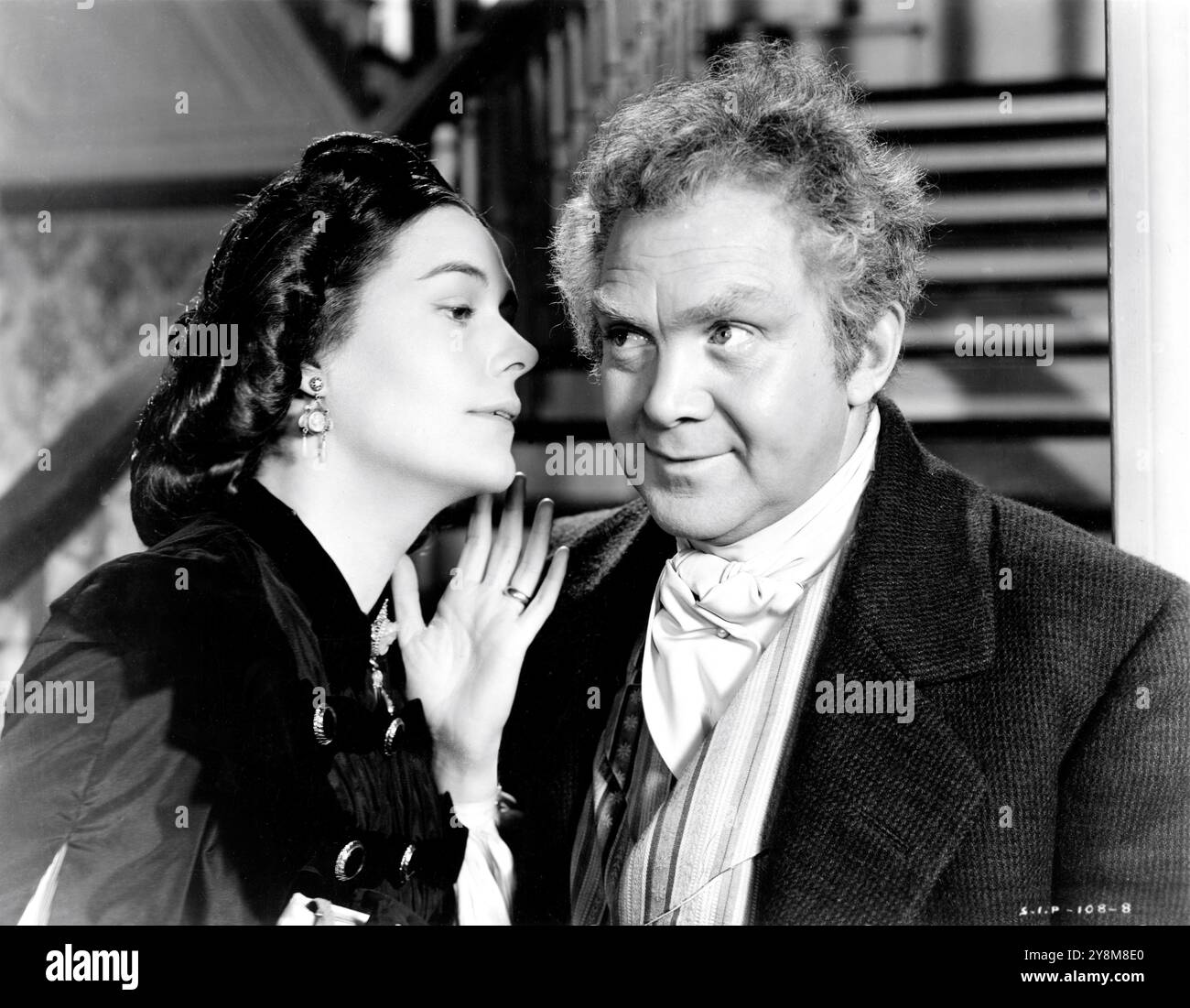 BARBARA O'NEILL as Ellen O'Hara and THOMAS MITCHELL as Gerald O'Hara in ...