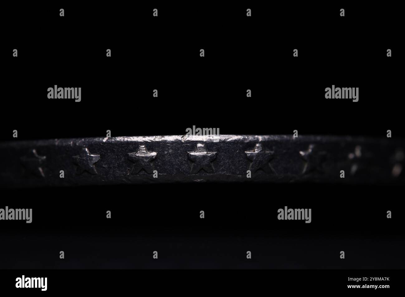 Coin edge, metallic silver star, metal in the darkness, Silver coin in ...