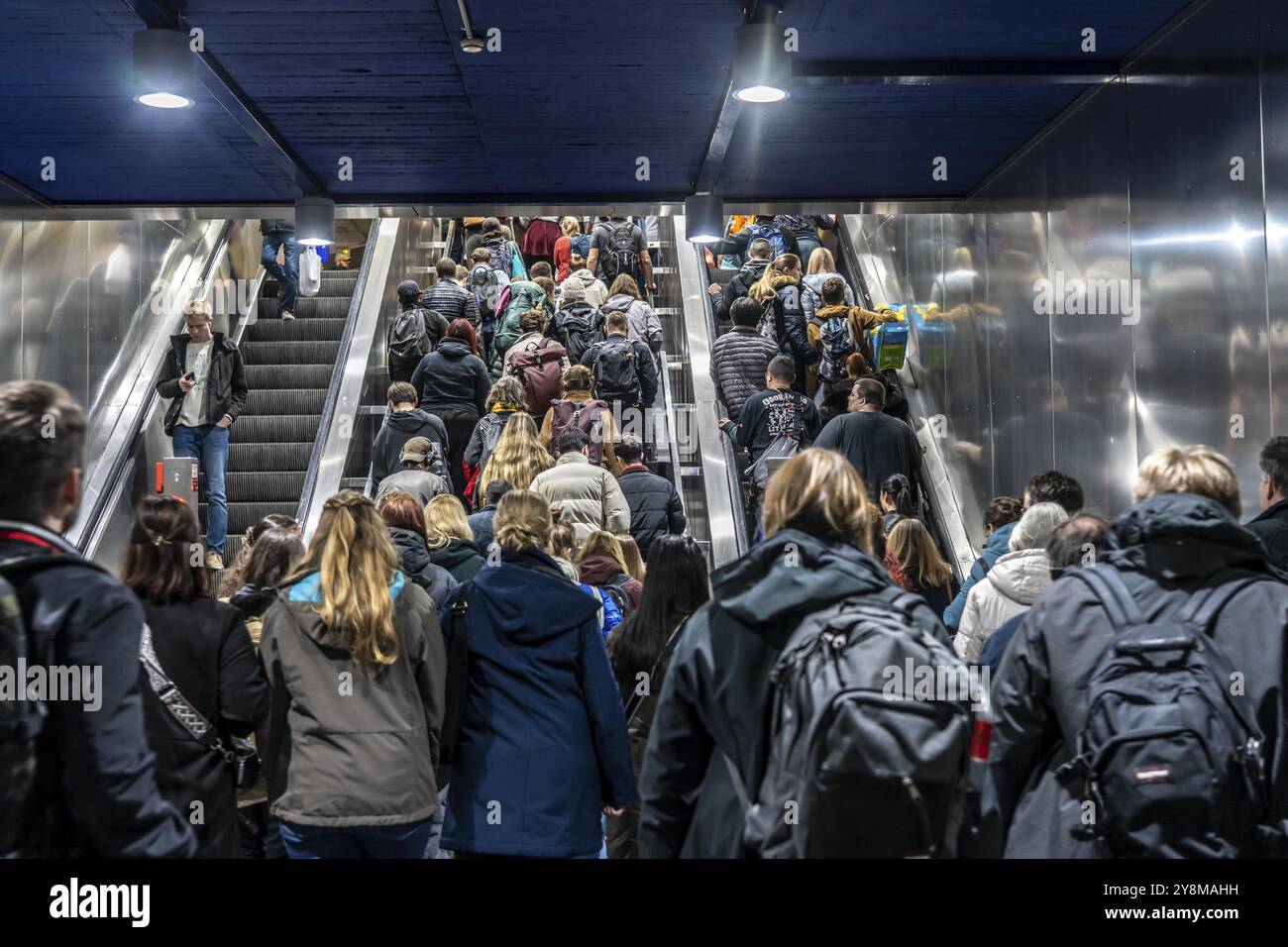 Public transport, underground, main station exit, many people crowding ...