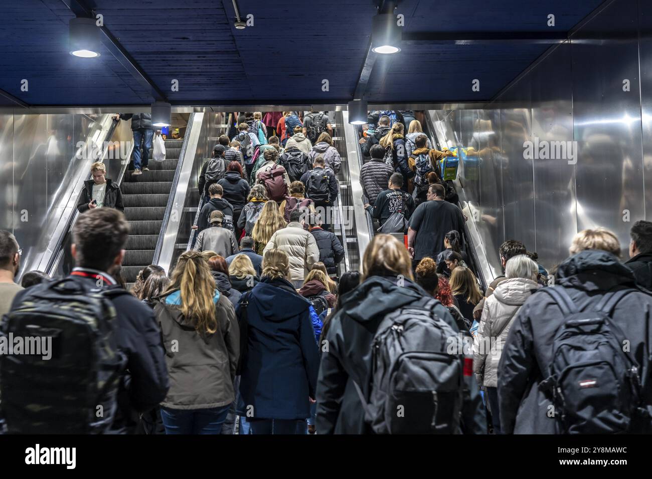 Public transport, underground, main station exit, many people crowding ...