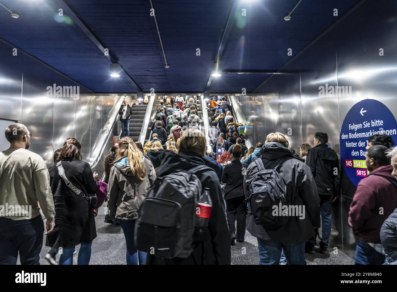 Public transport, underground, main station exit, many people crowding ...