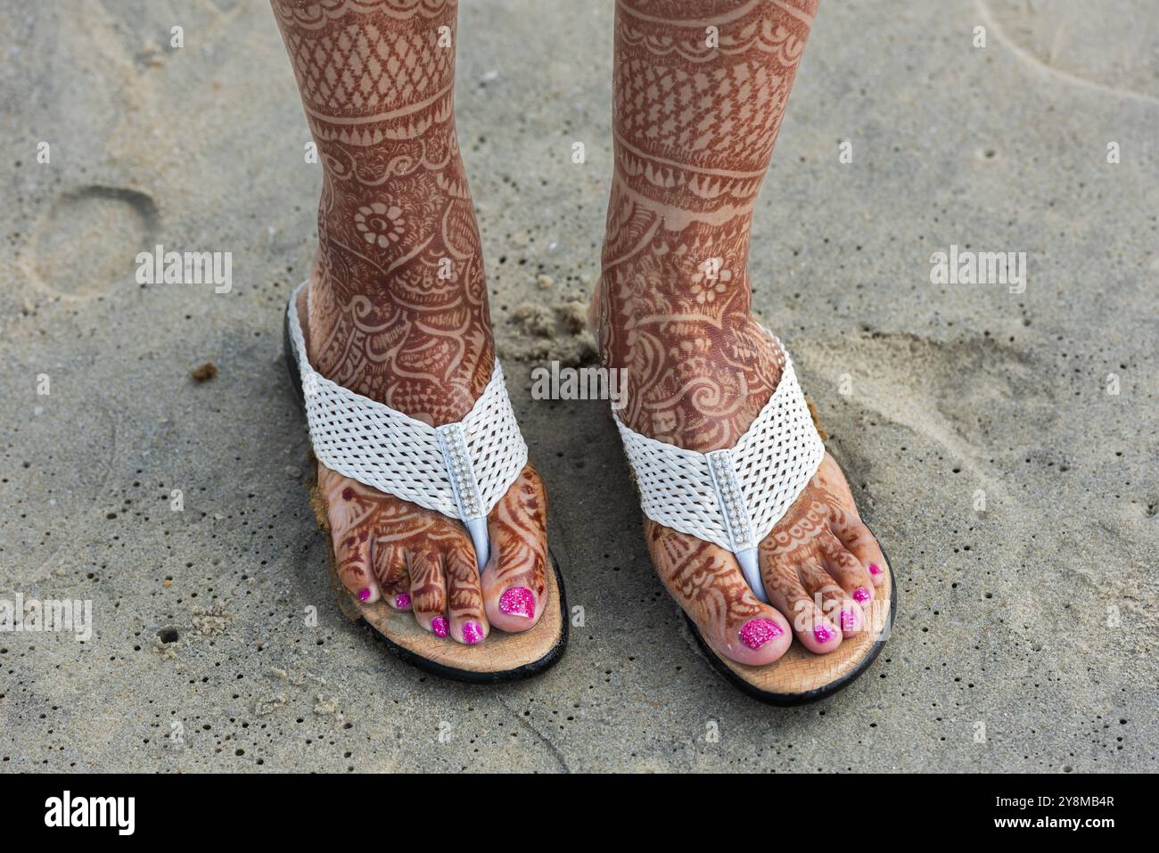 Henna painting, henna, feet of a bride painted with traditional mehndi ...
