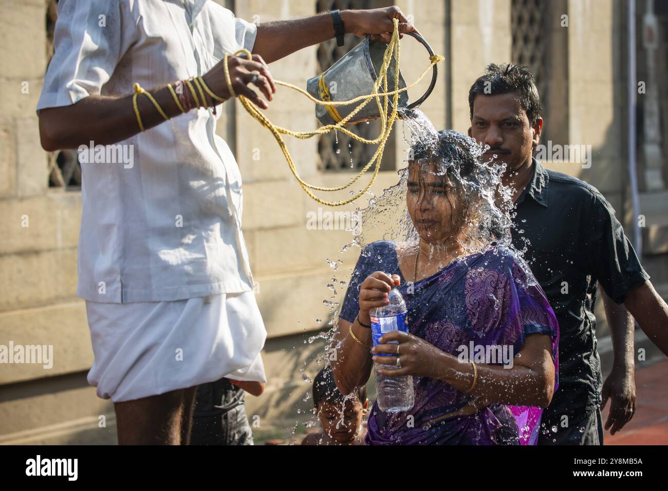 Pilgrims at a washing ritual with 22 stations around the Ramanathaswami ...