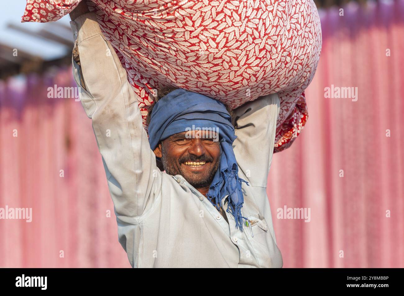 Pink cloth on head hi-res stock photography and images - Alamy
