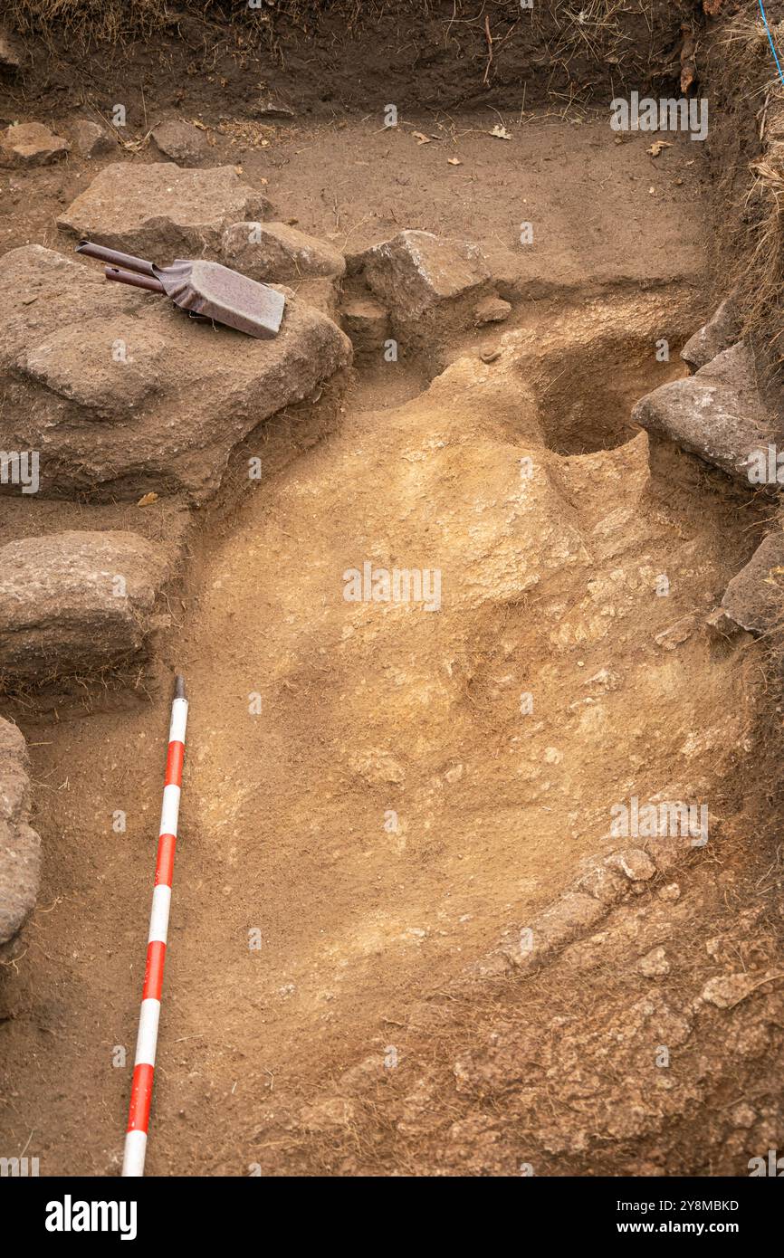 iron-age stone ruins excavated in an archaeological dig, archeology ...