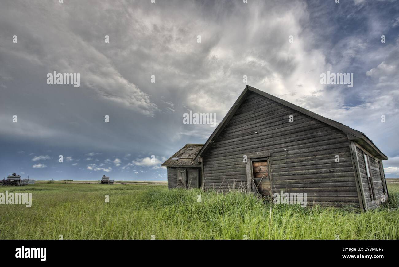 Abandoned Farm with storm clouds in the Canadian Prairie Stock Photo ...