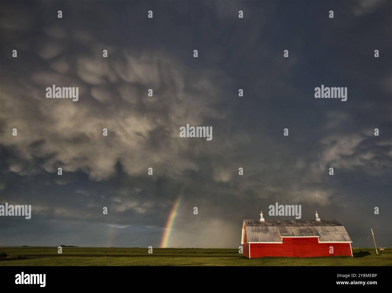 Abandoned Farm with storm clouds in the Canadian Prairie Stock Photo ...