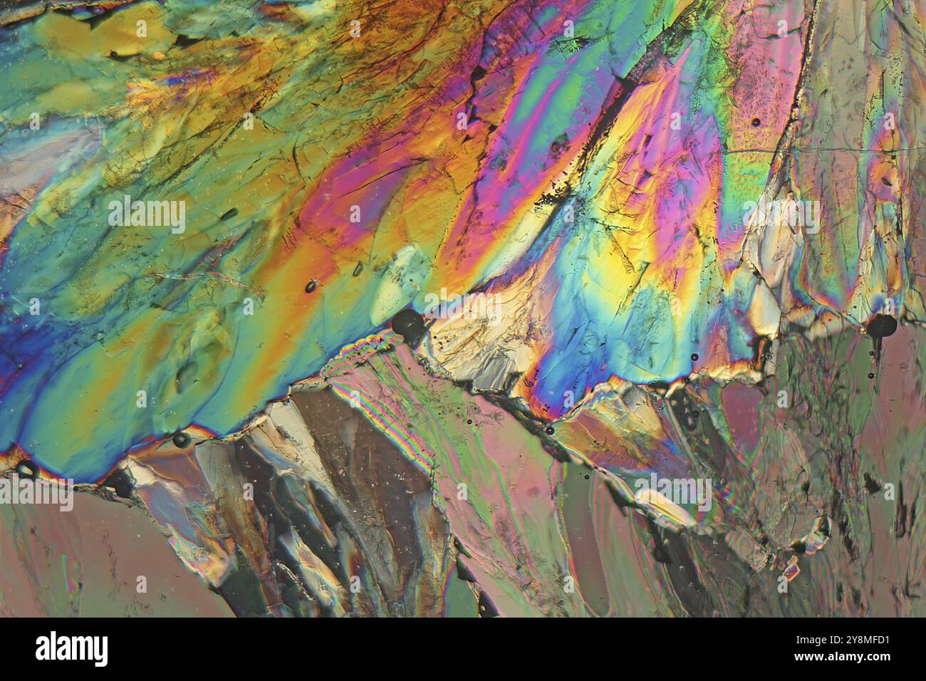 Sugar crystals under the microscope and in polarised light Stock Photo ...