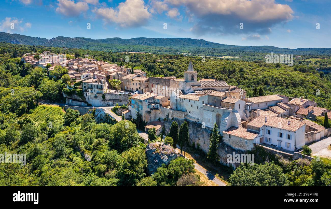 View of Venasque village with old church Notre Dame de Vie to landscape ...