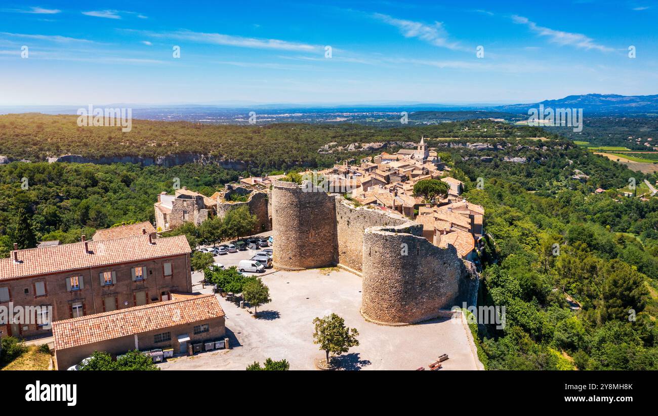 View of Venasque village with old church Notre Dame de Vie to landscape ...
