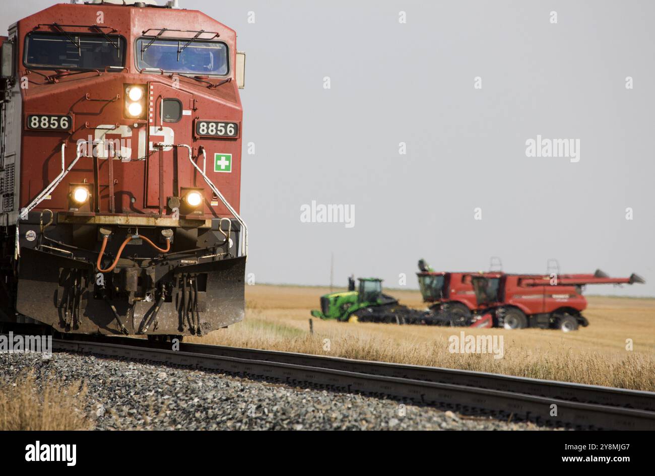 Train and Combine Prairie Scene Saskatchewan Canada Stock Photo - Alamy
