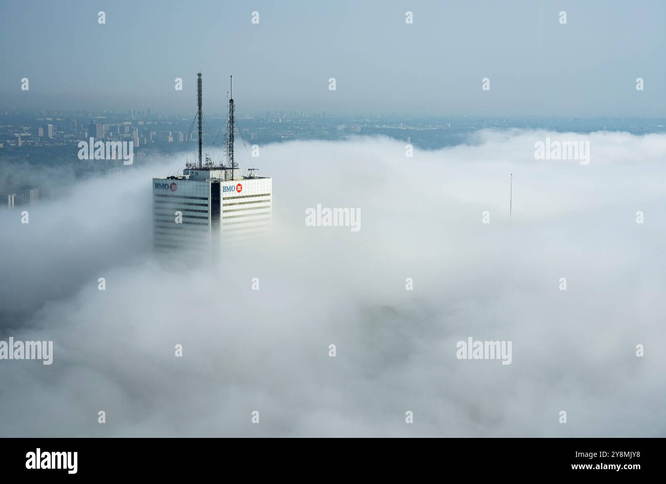 View of Toronto from the CN Tower observation deck, on a cloudy day ...