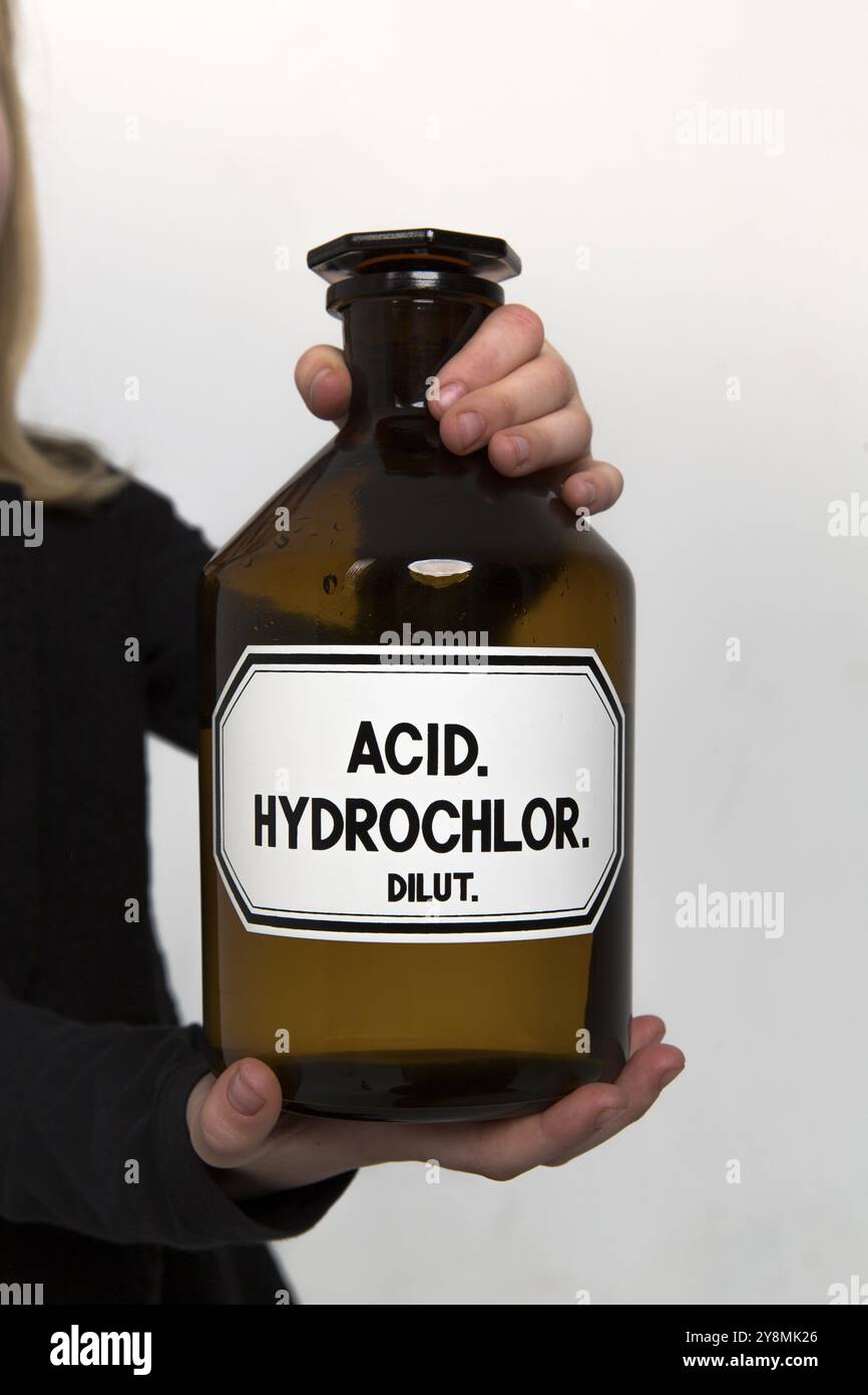 Poison in children's hands Stock Photo - Alamy