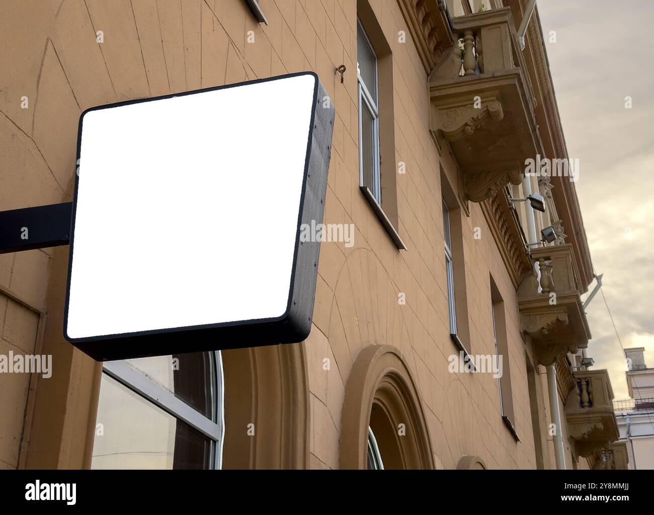Outdoor signboard mockup on a city street. Blank and empty board ...