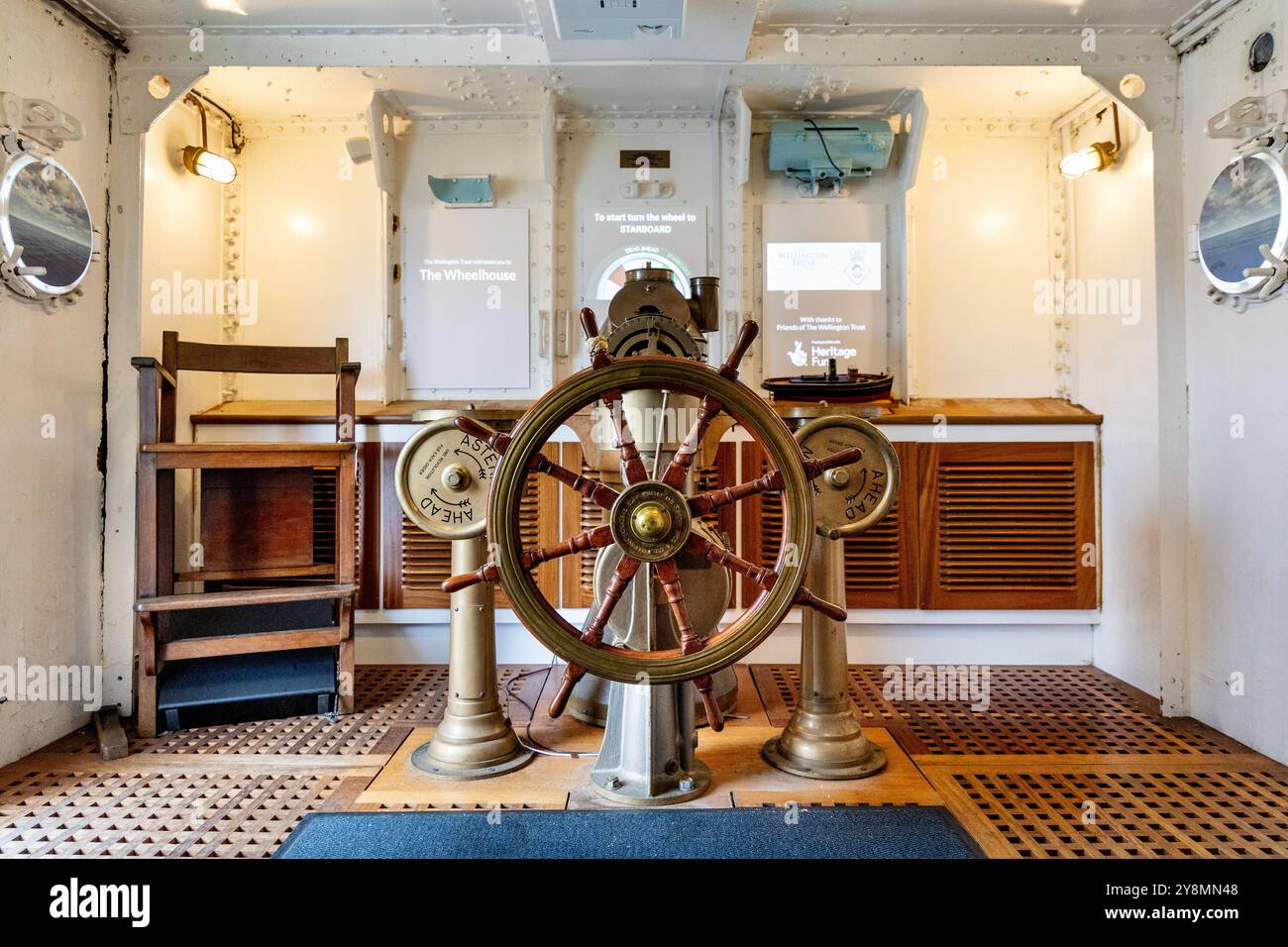 The bridge with the ship's wheel and navigation instruments aboard 1934 ...
