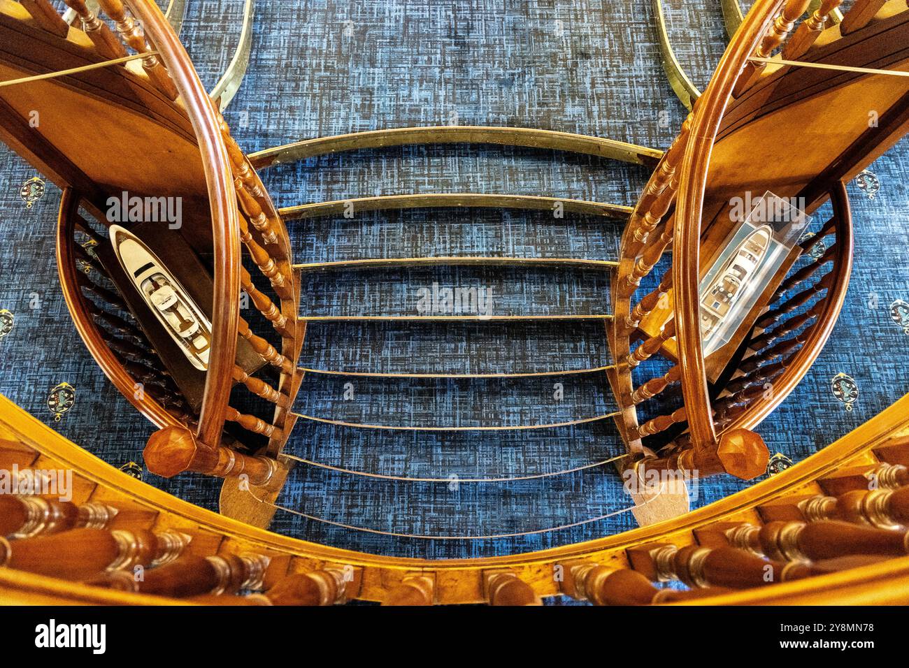 Wooden staircase with blue carpet aboard 1934 former Royal Navy HMS ...