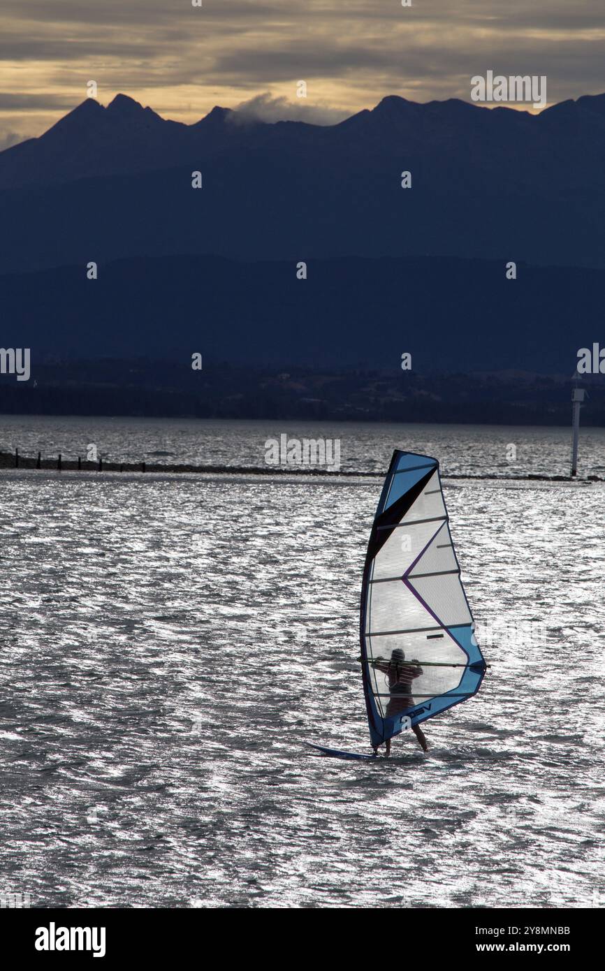 Sailboard wind surfer Nelson New Zealand windy day Stock Photo - Alamy