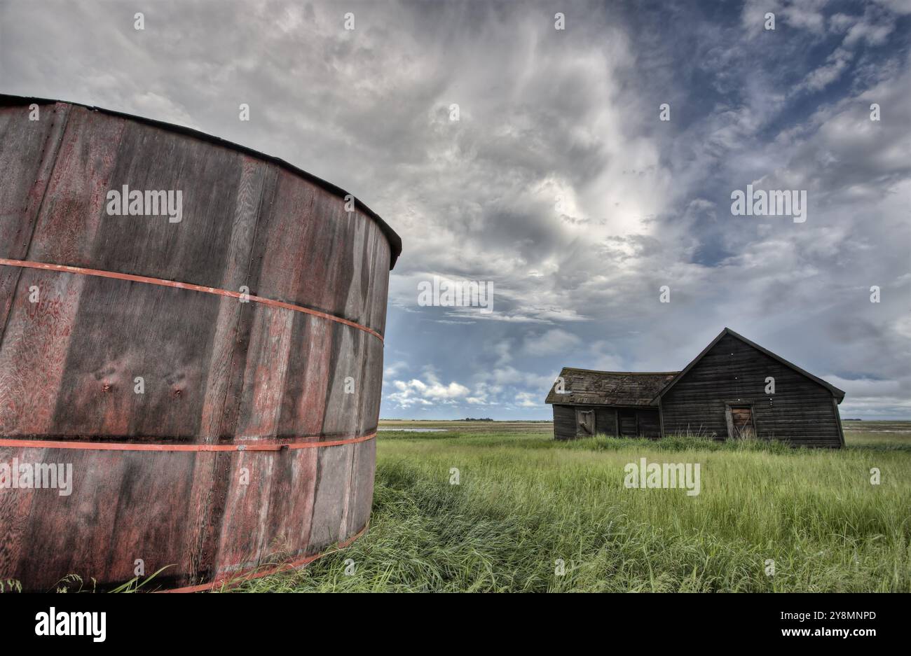 Abandoned Farm with storm clouds in the Canadian Prairie Stock Photo ...
