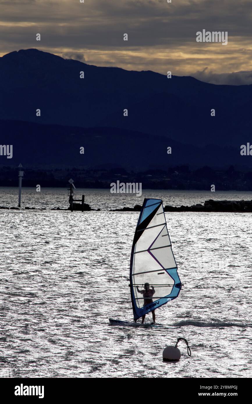Sailboard wind surfer Nelson New Zealand windy day Stock Photo - Alamy