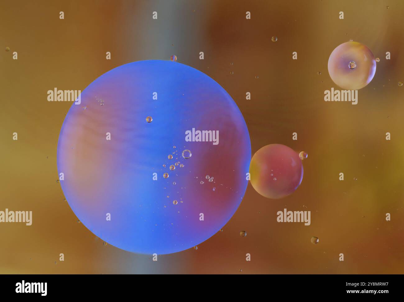 Colorful abstract macro background with oil drops in water Stock Photo ...