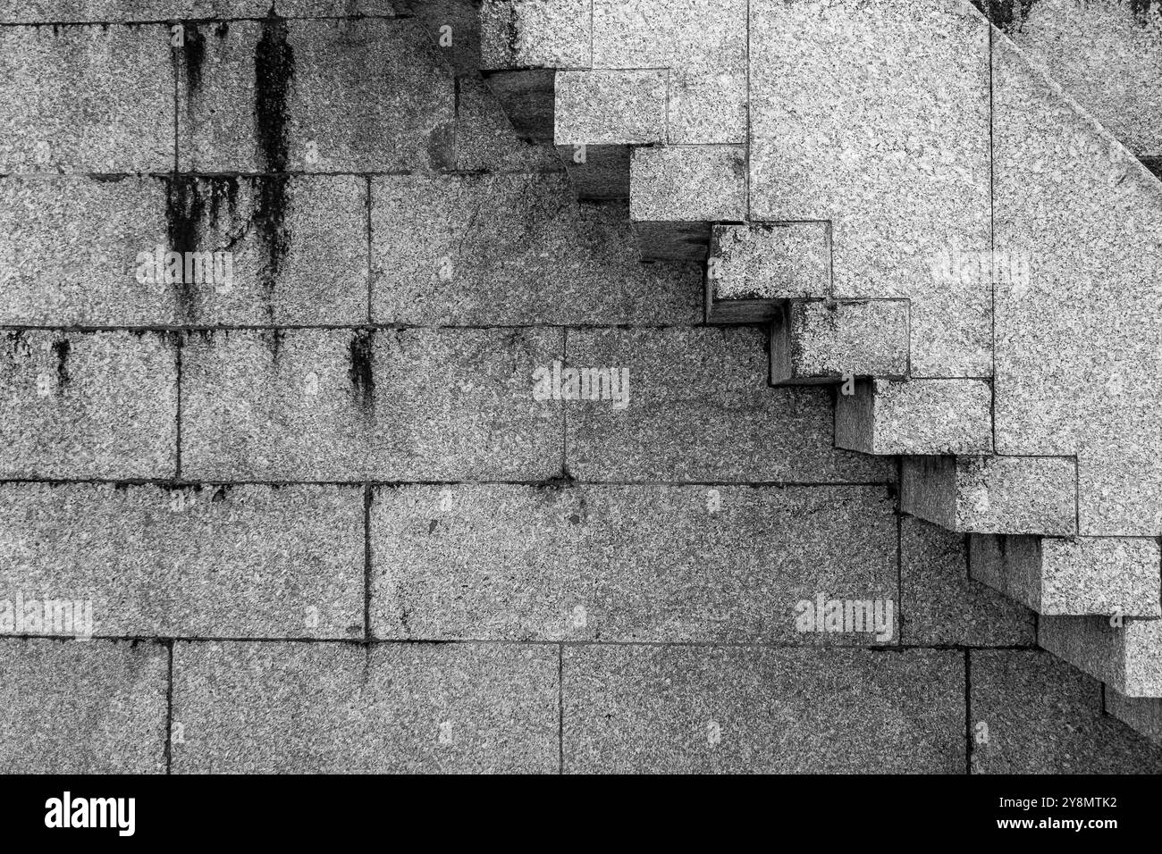 Stone stairs built on a gray granite wall Texture concept Stock Photo ...
