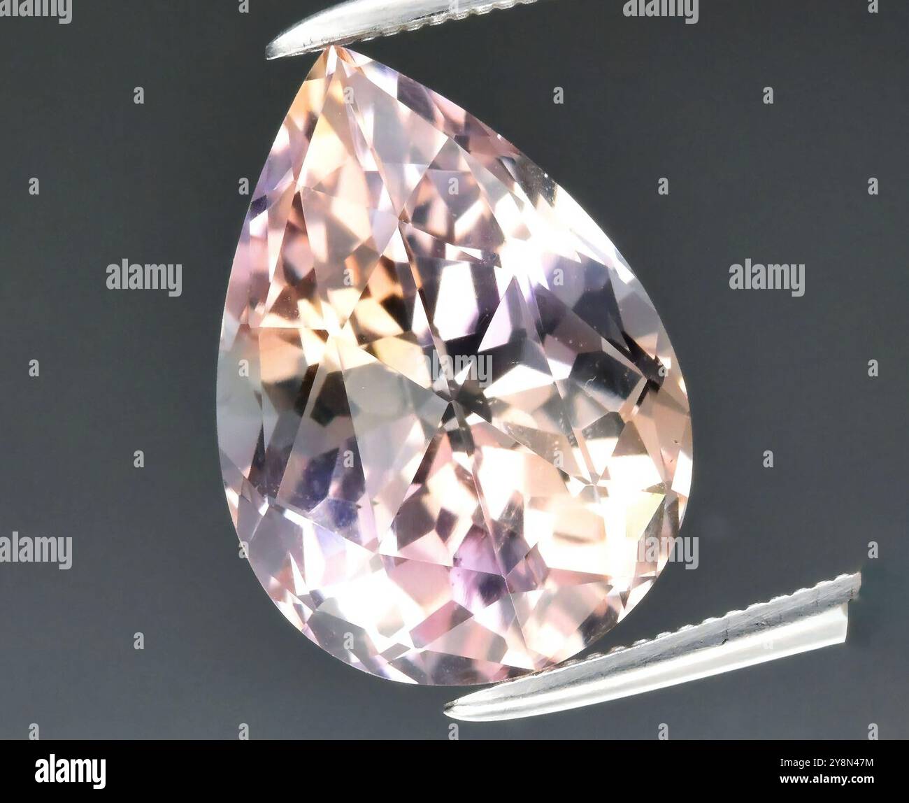 Exquisite Pear-Shaped Natural Gemstone with Subtle Lavender Hues and ...
