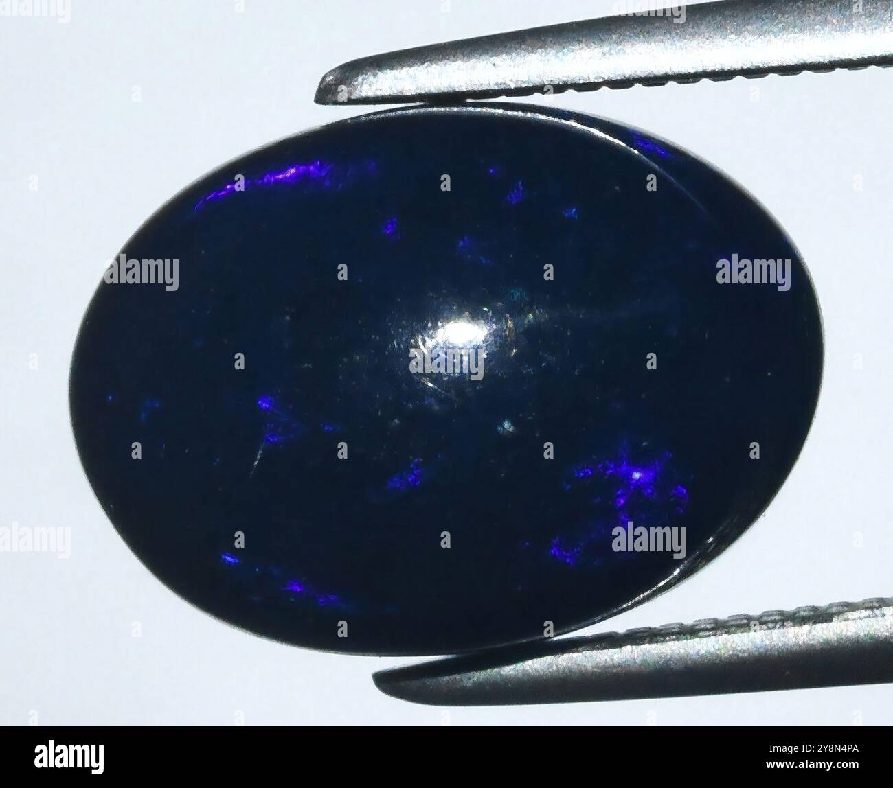 Exquisite Deep Blue Natural Gemstone Displaying Iridescent Patterns and ...