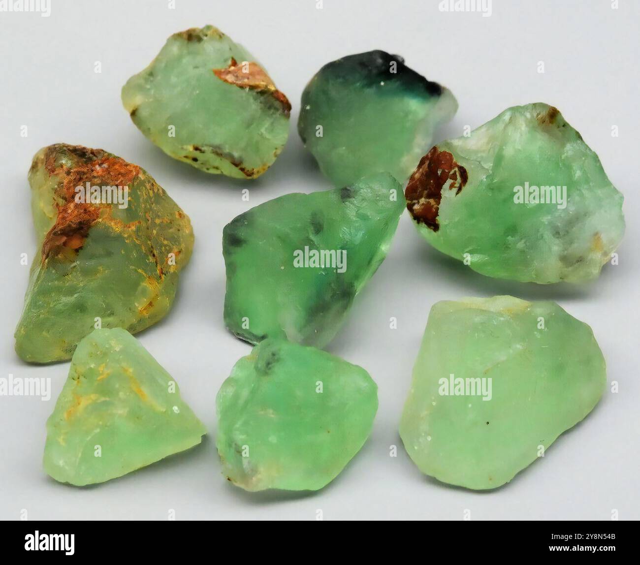 Stunning Collection of Natural Green Gemstones Showcasing Unique Shapes ...