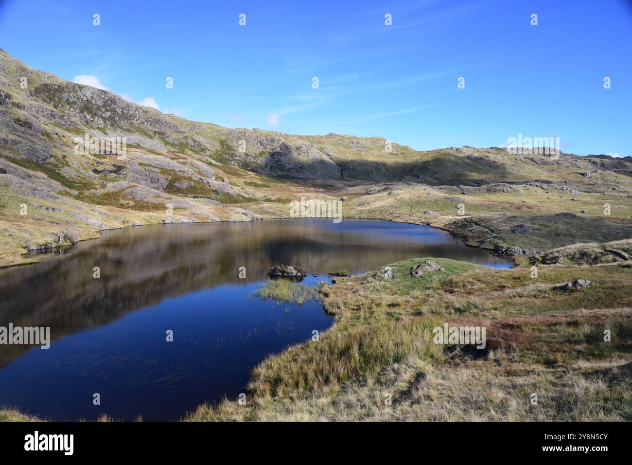 The beautifully isolated Codale tarn set high up in the Lakelands fells ...