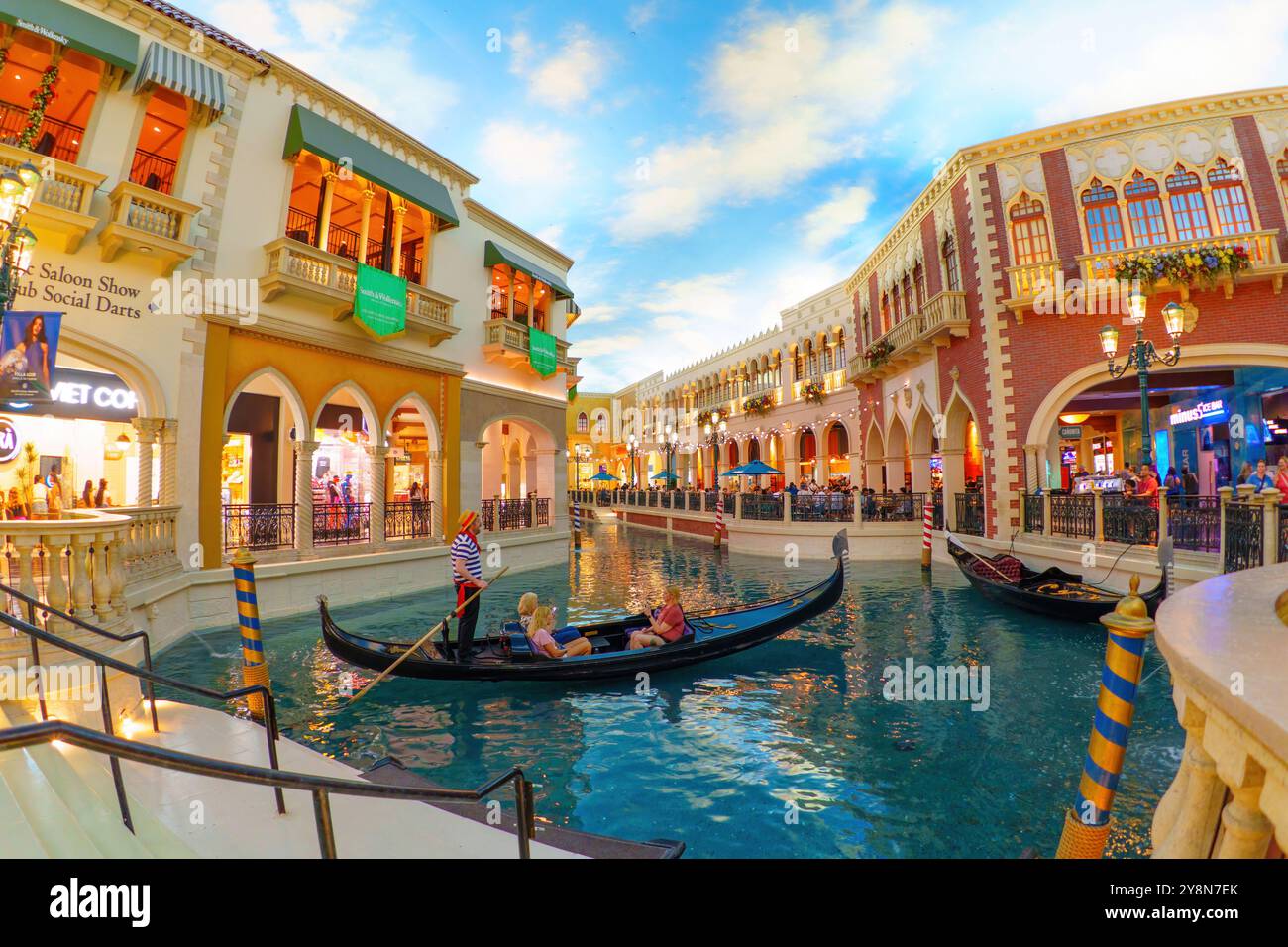 Las Vegas, Nevada - April 13, 2024: Charming gondola ride on the canal at The Venetian with ...