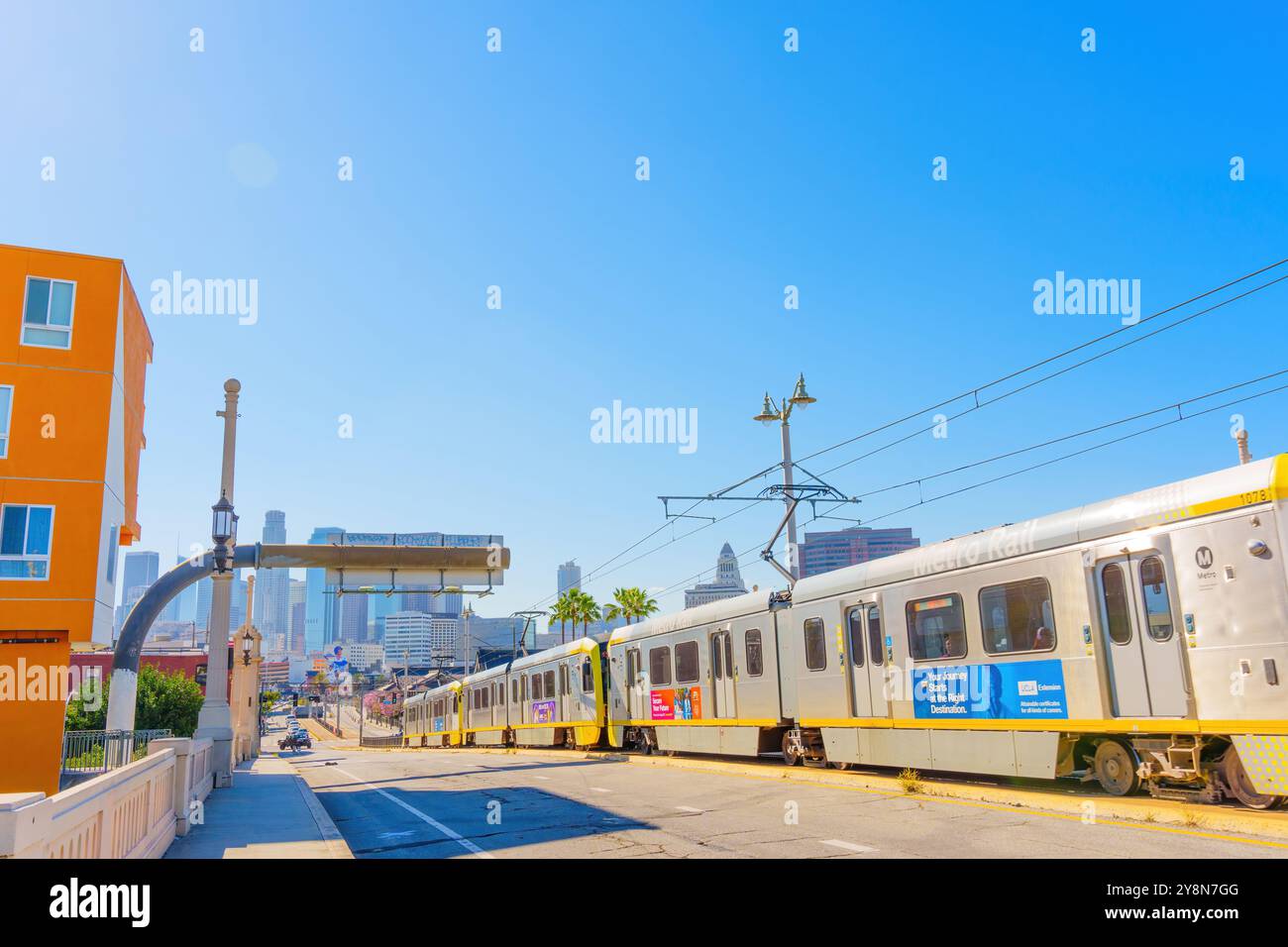 Los Angeles, California - April 4, 2024: Light rail train passing under ...