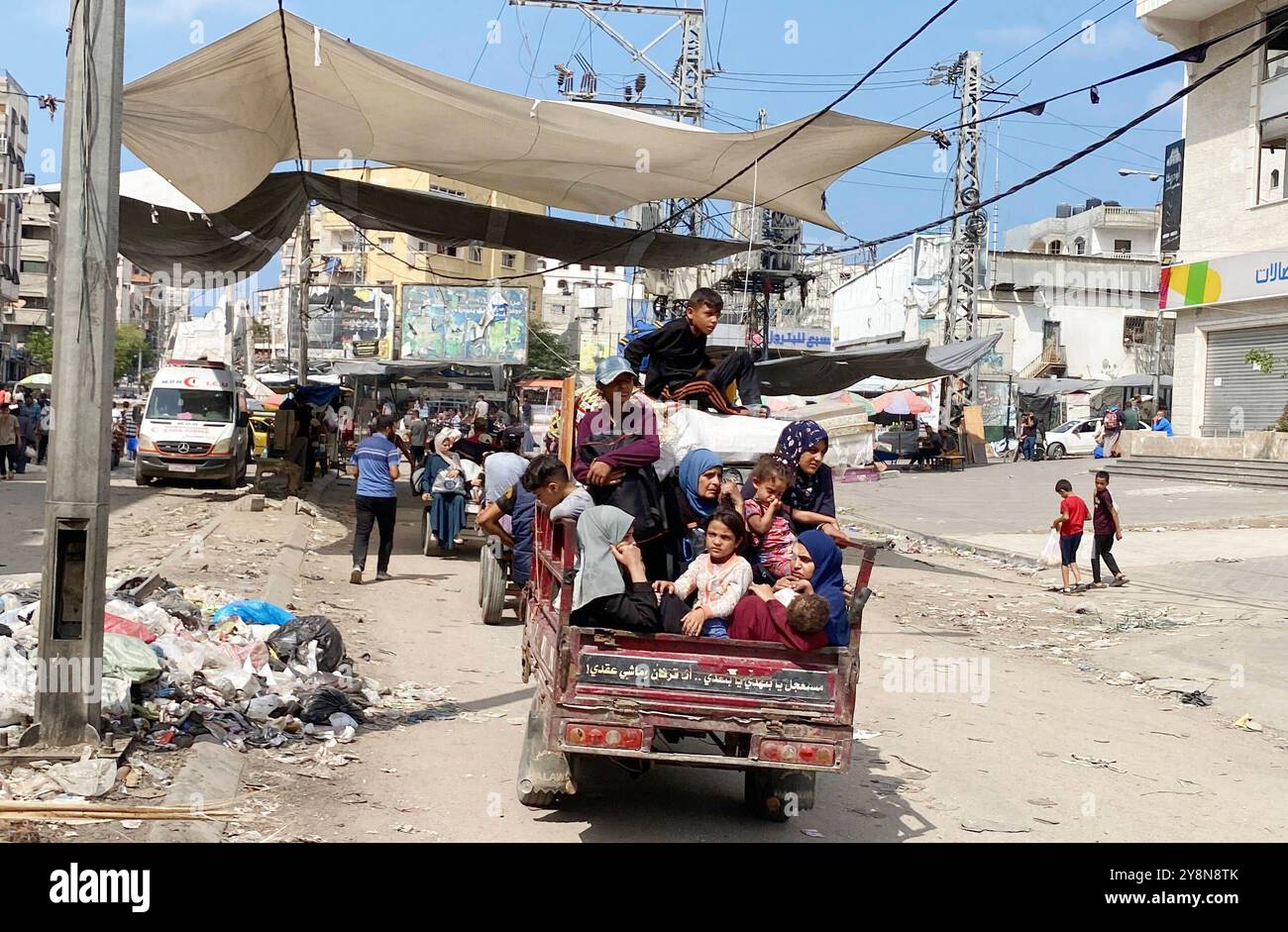 Residents flee to places they deem safe with the belongings they can ...