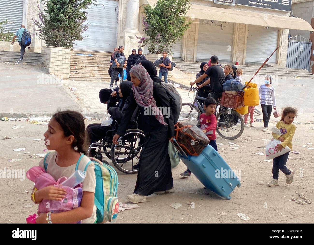 Residents flee to places they deem safe with the belongings they can ...