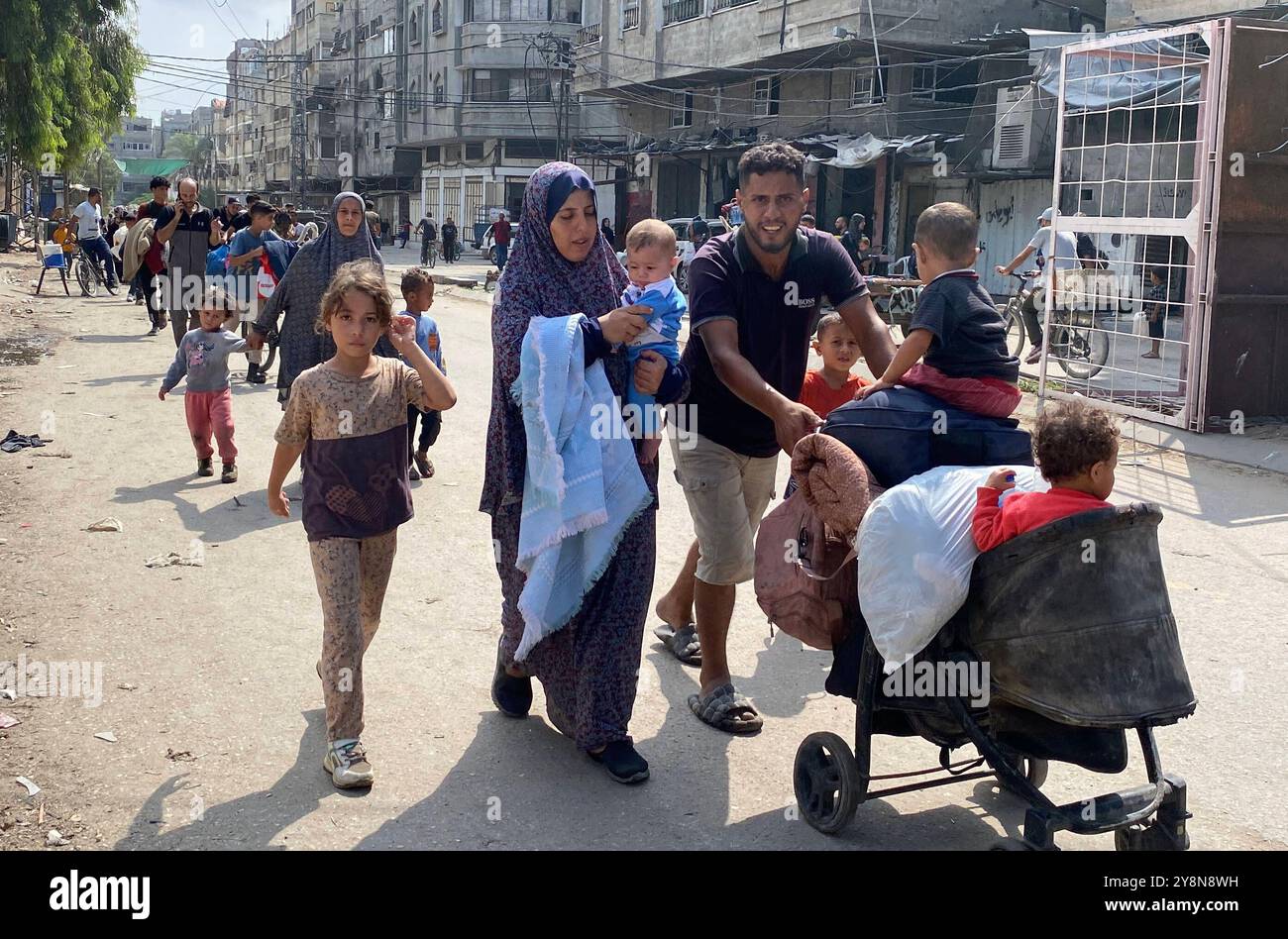 Residents flee to places they deem safe with the belongings they can ...