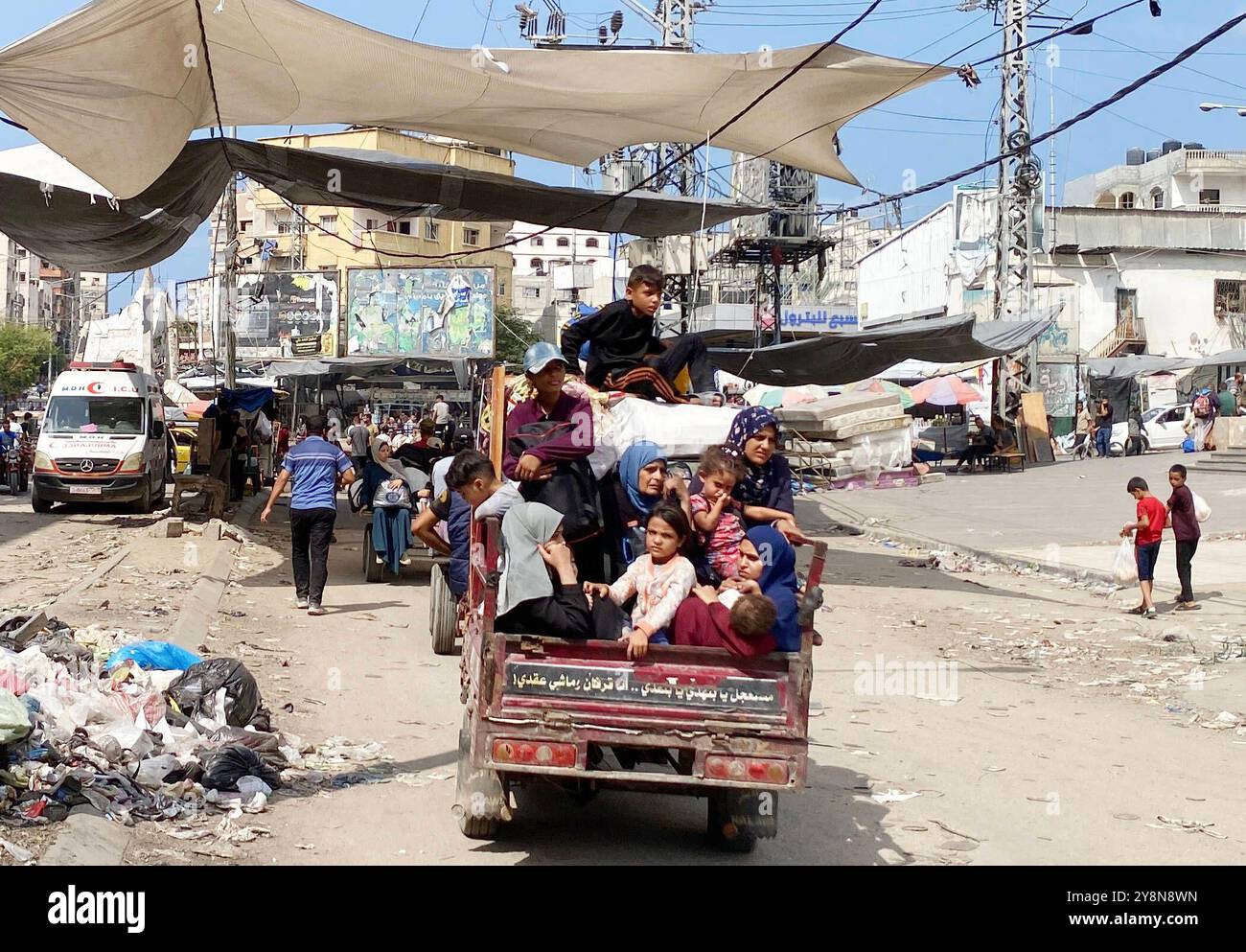 Residents flee to places they deem safe with the belongings they can ...