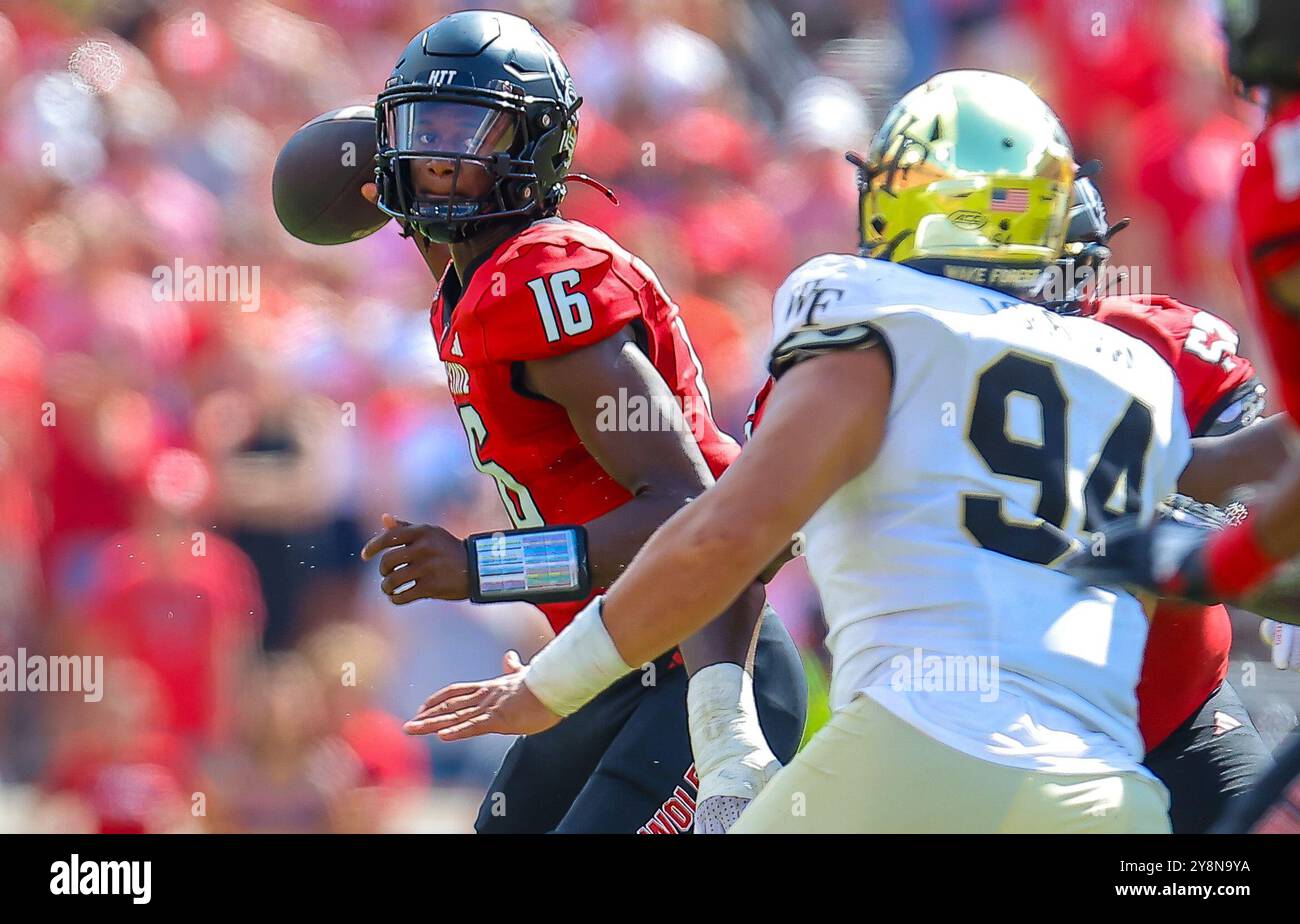 October 5, 2024: NC State freshman CJ Bailey (16) looks to throw ball ...