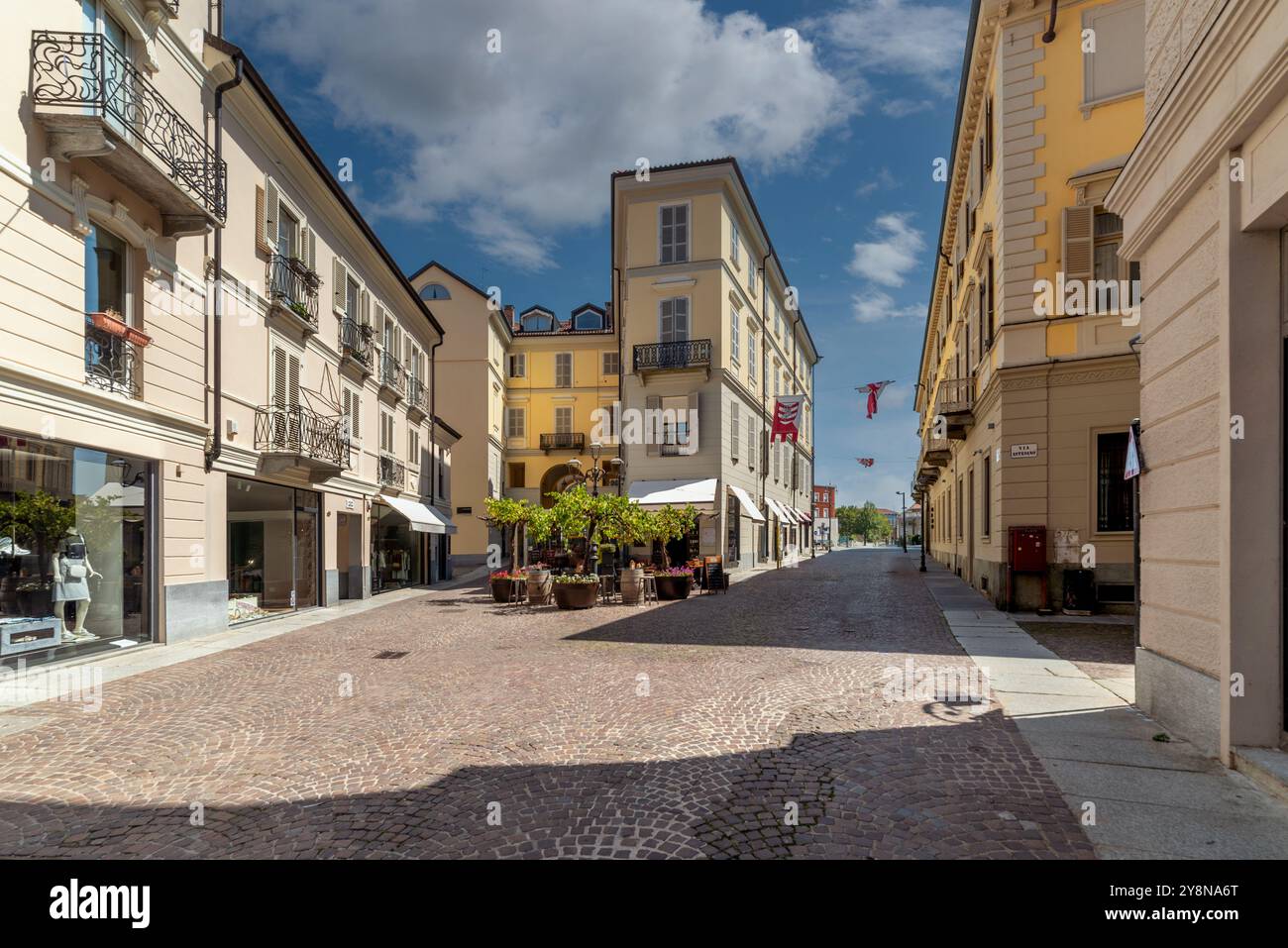 Asti, Italy - August 20, 2024: Giuseppe Gardini cobblestone street with ...