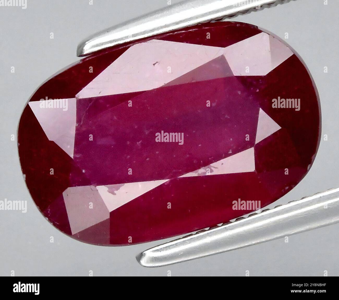 Exquisite Deep Red Ruby Gemstone Displayed with Precision Stock Photo ...