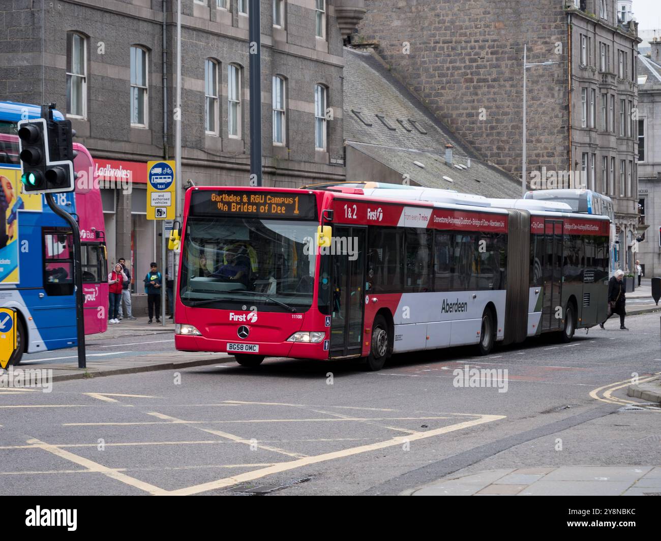 First Bus bendy bus in Aberdeen Stock Photo - Alamy